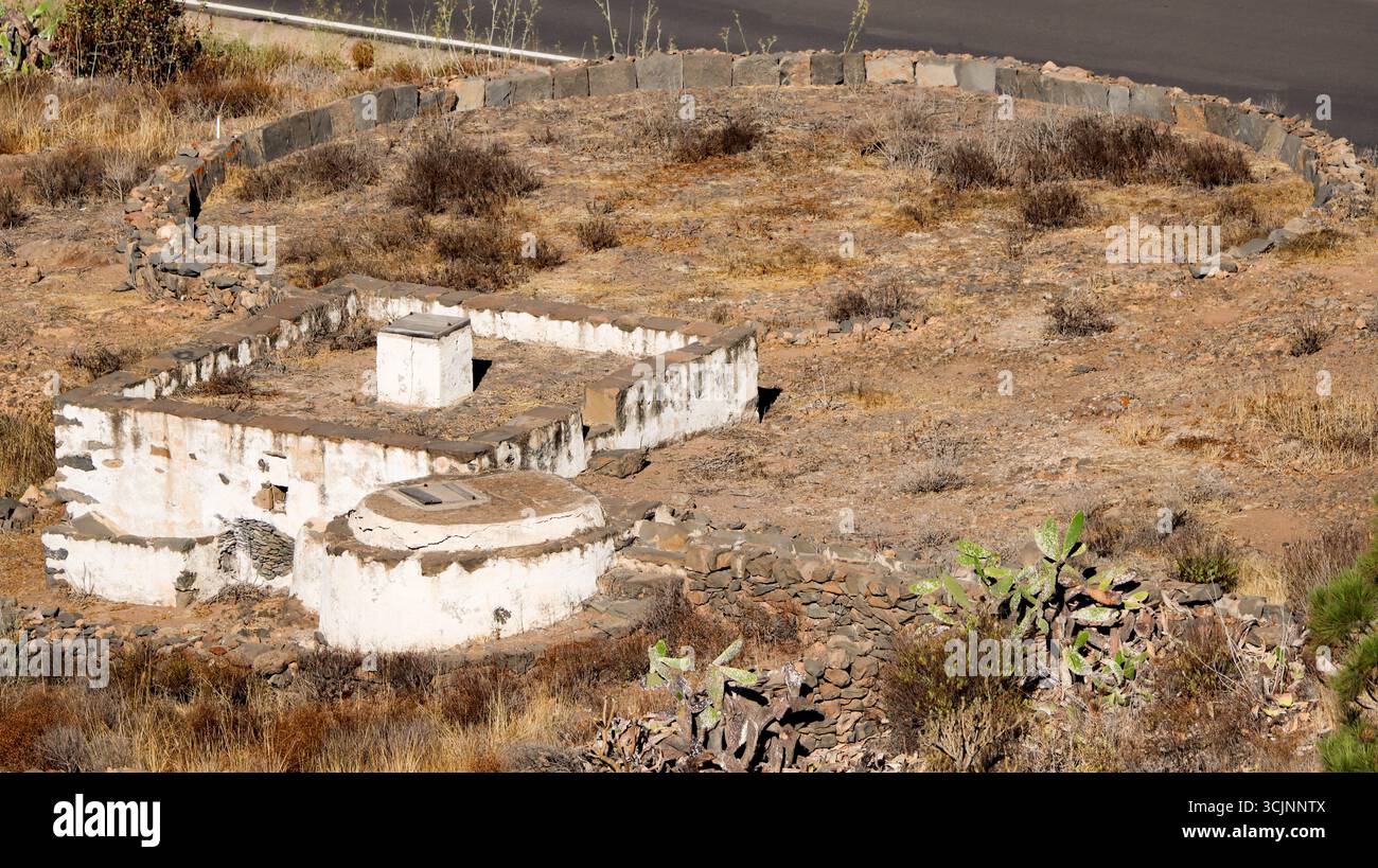 Photo of an old traditional cistern and washing place next to a ...