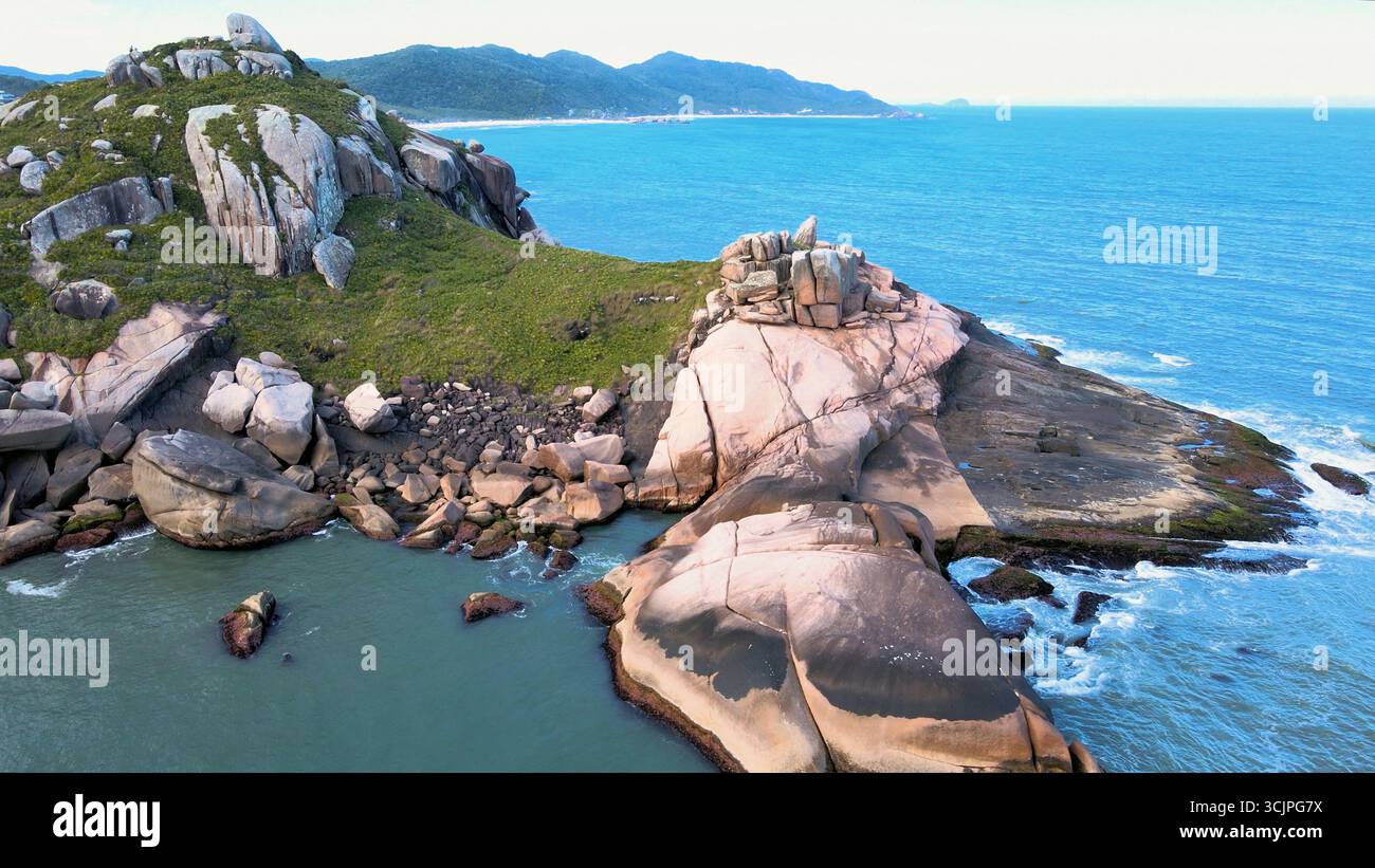 Aerial view of the rocky shore of Gravata Beach in Florianopolis, Santa ...