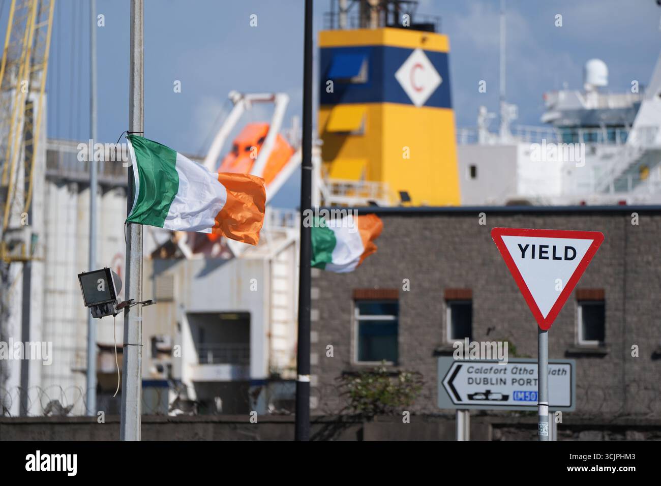 Irish tricolour flags, the national flag of Ireland, are flown near the ...