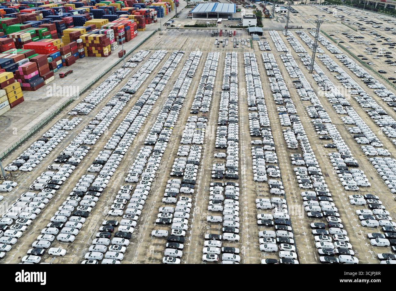 New Volvo cars wait for shipment in a port in Nanjing in east China's ...