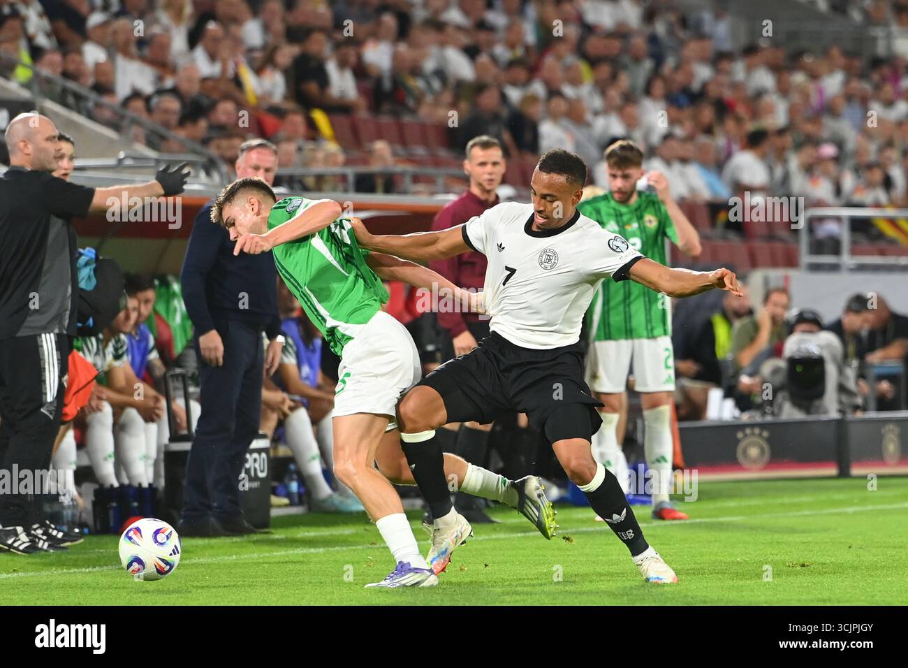 Jamie LEWELING (GER), action, duels versus Trai HUME (NIR) football ...