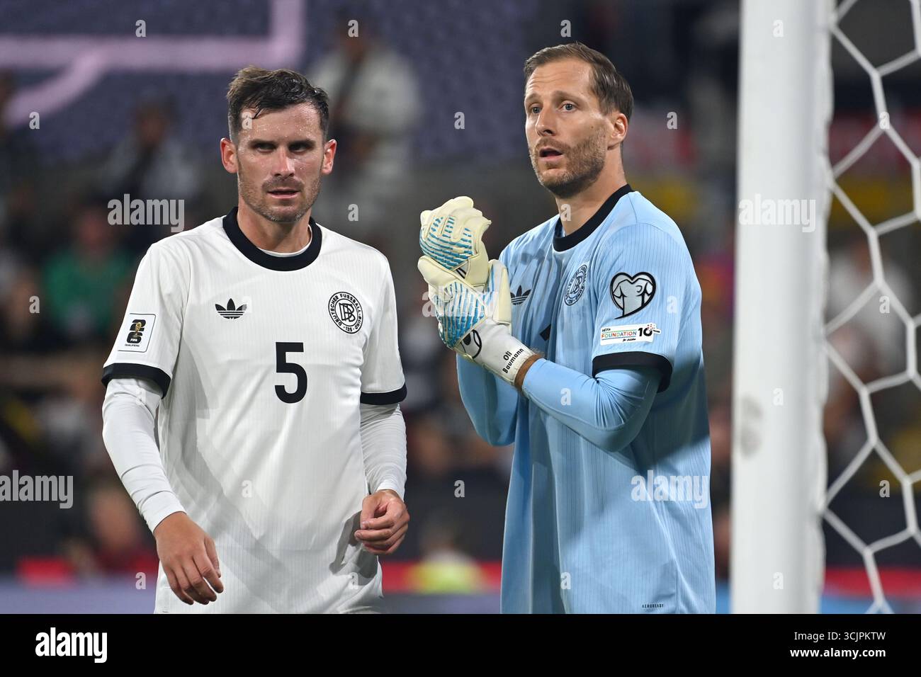 From left: Pascal GROSS (GER), goalkeeper Oliver BAUMANN (GER), action ...