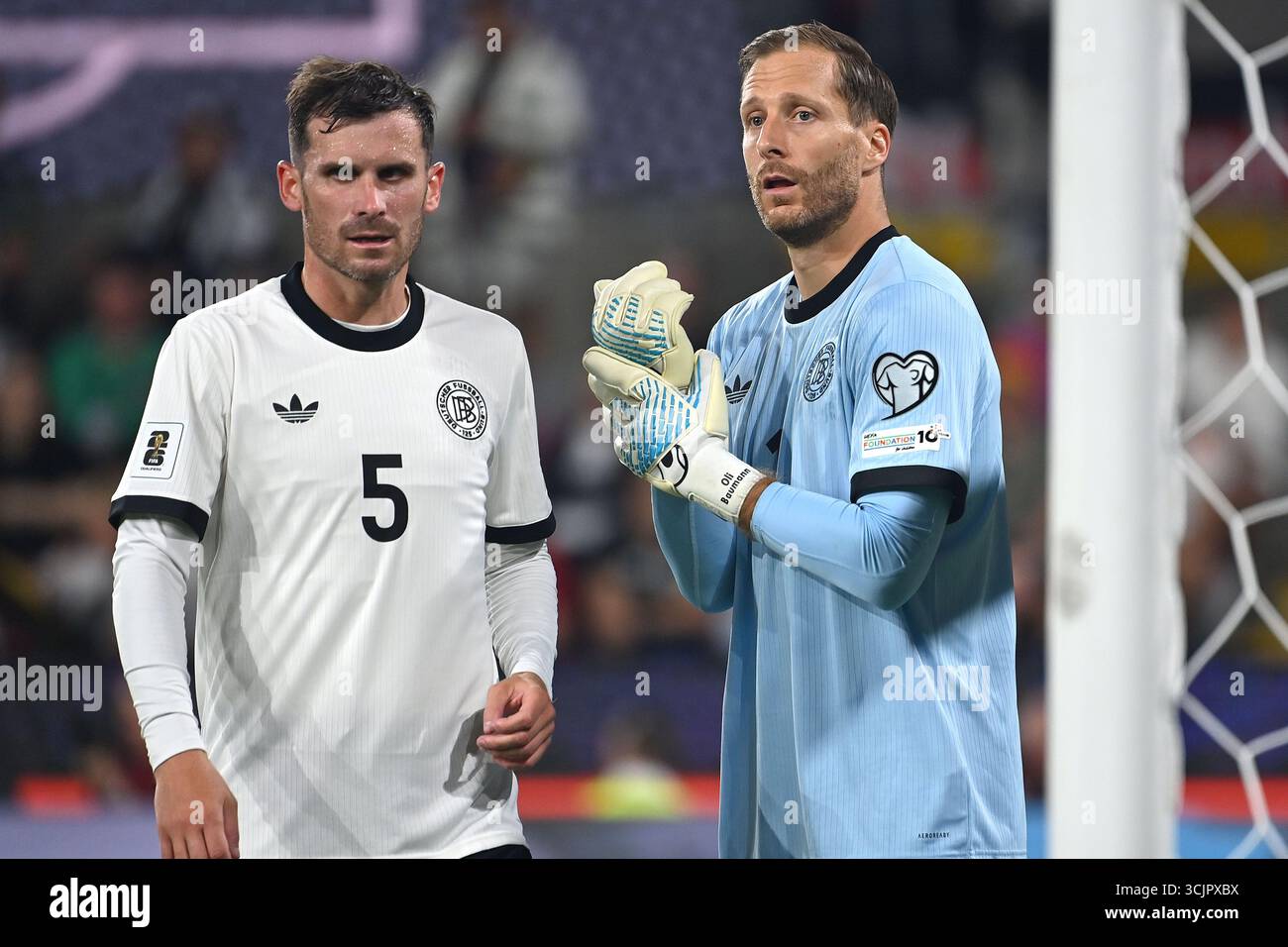 From left: Pascal GROSS (GER), goalkeeper Oliver BAUMANN (GER), action ...