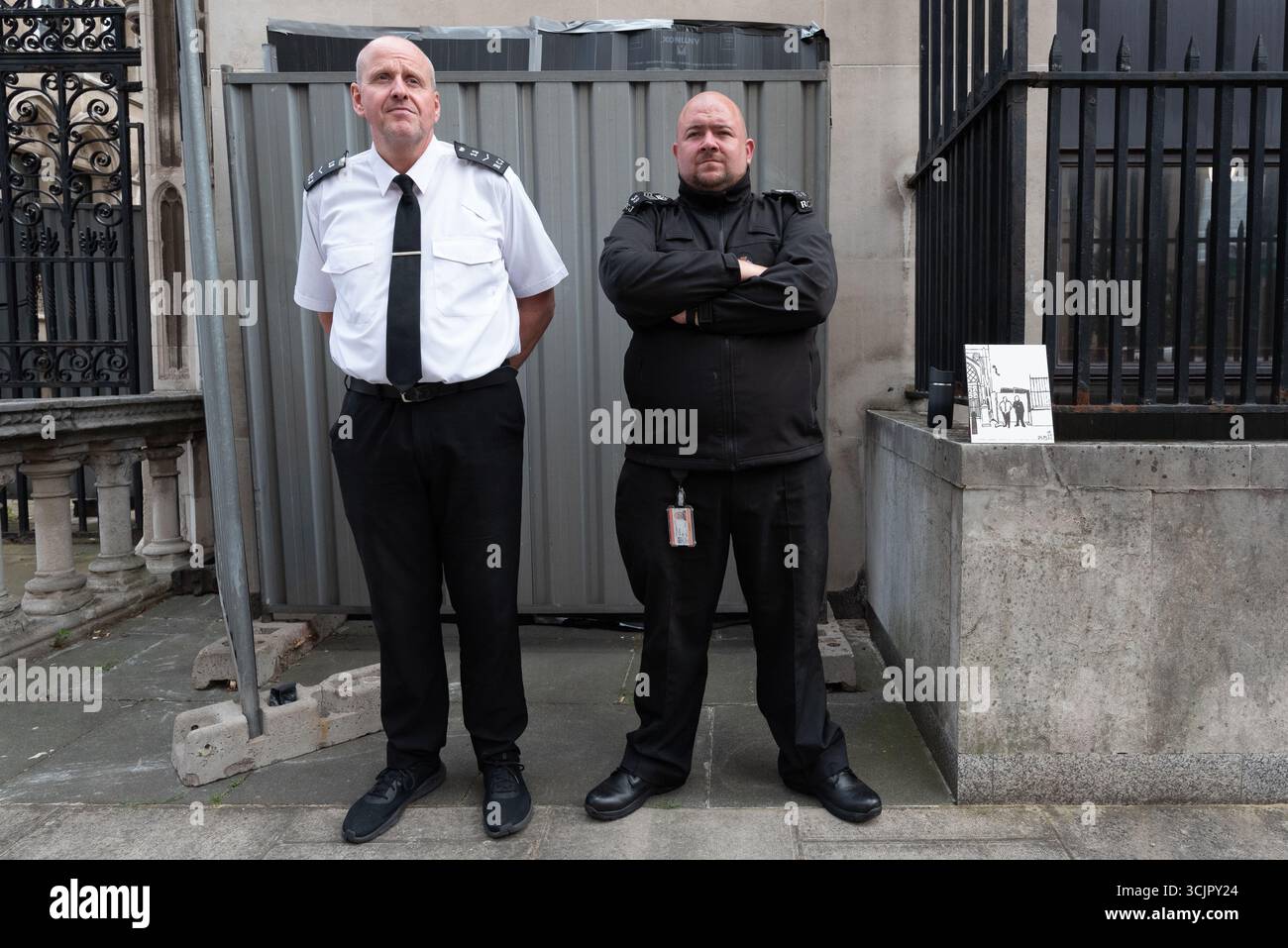 London, UK. 8 September, 2025. Security guards stand by a large metal ...