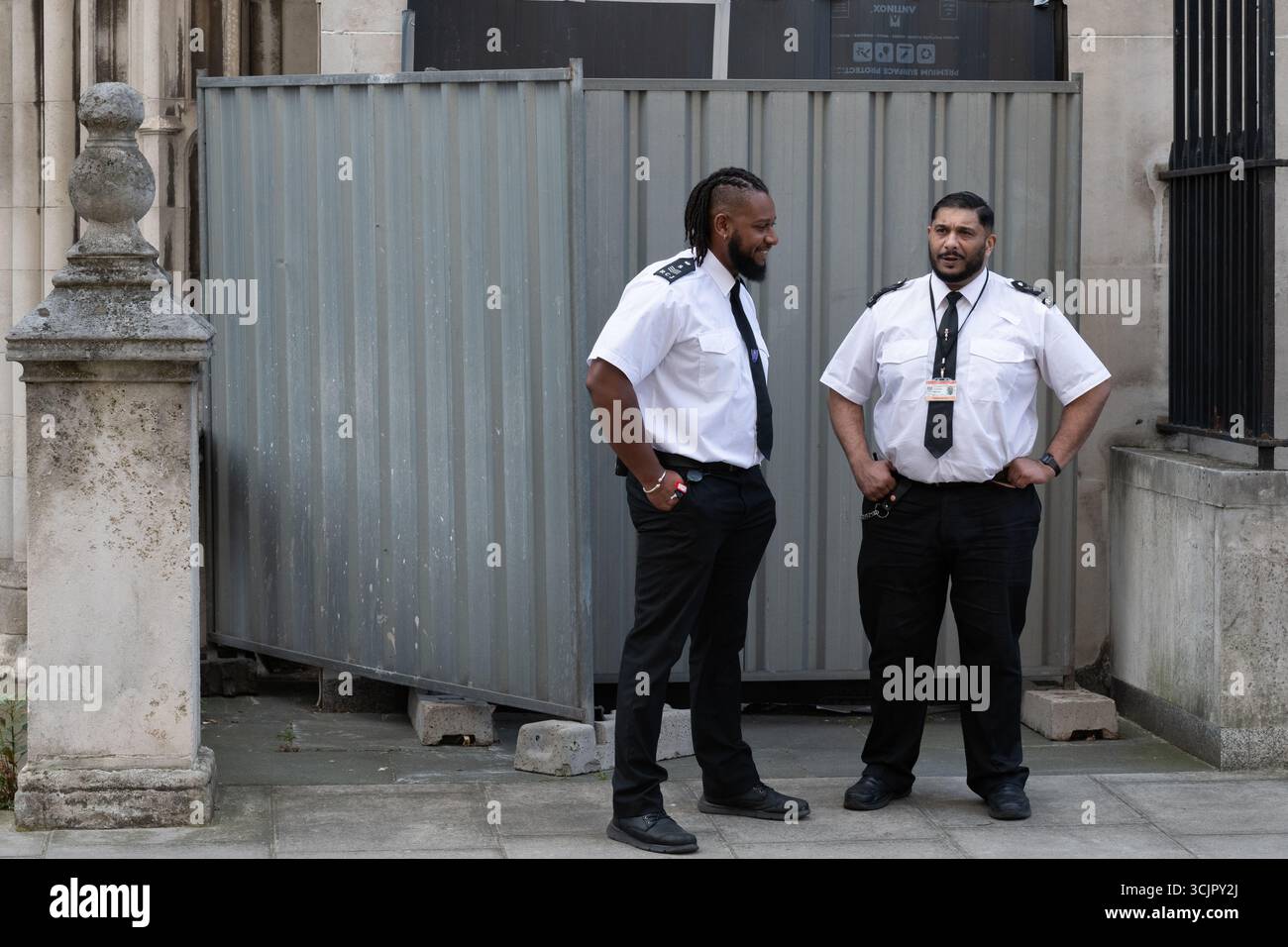 London, UK. 8 September, 2025. Security guards stand by a large metal ...