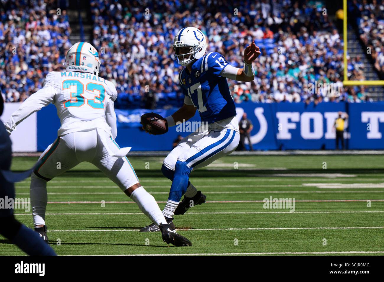 Indianapolis Colts quarterback Daniel Jones (17) scrambles from ...