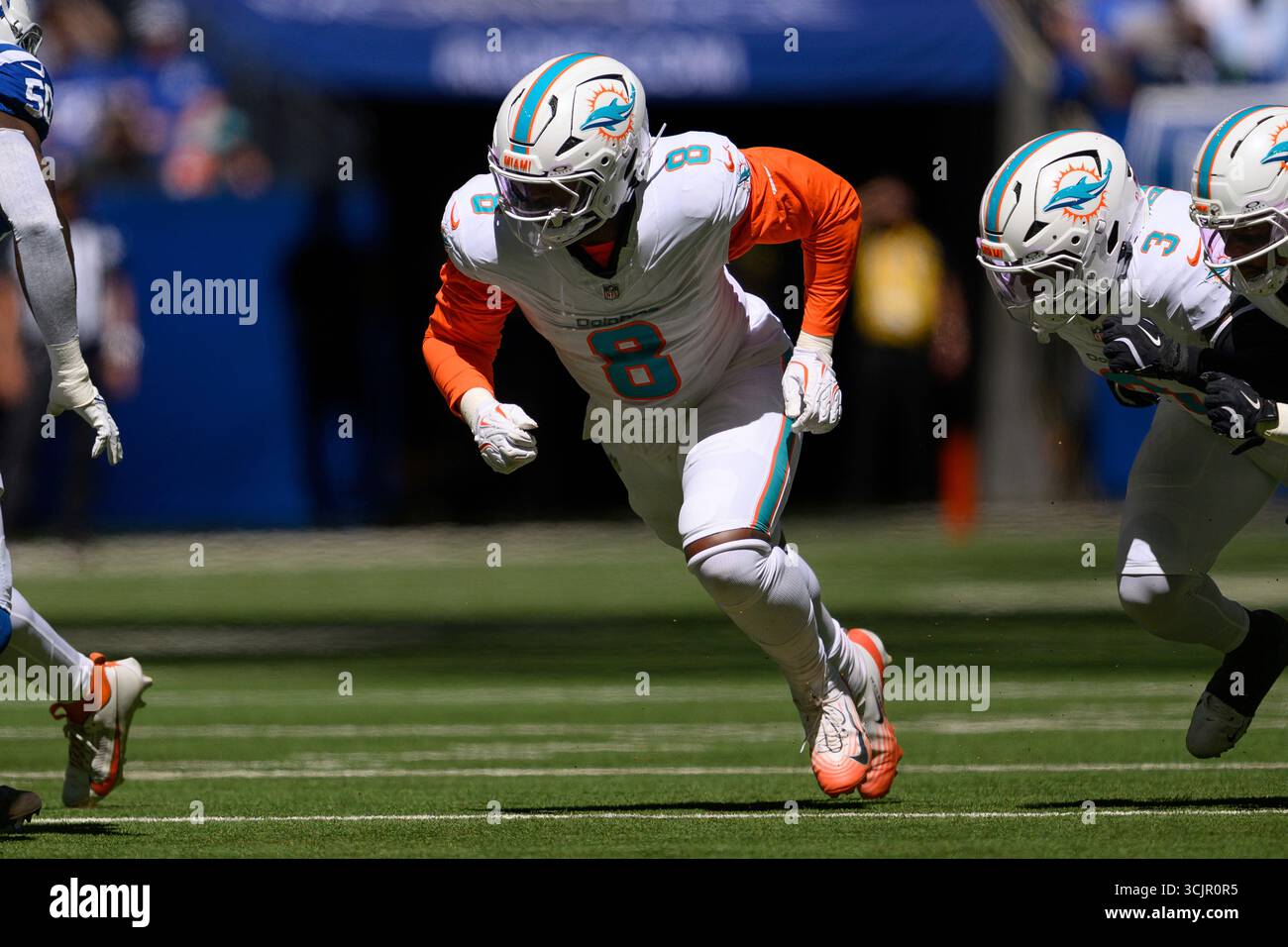 Miami Dolphins linebacker Matthew Judon (8) rushes around the edge ...