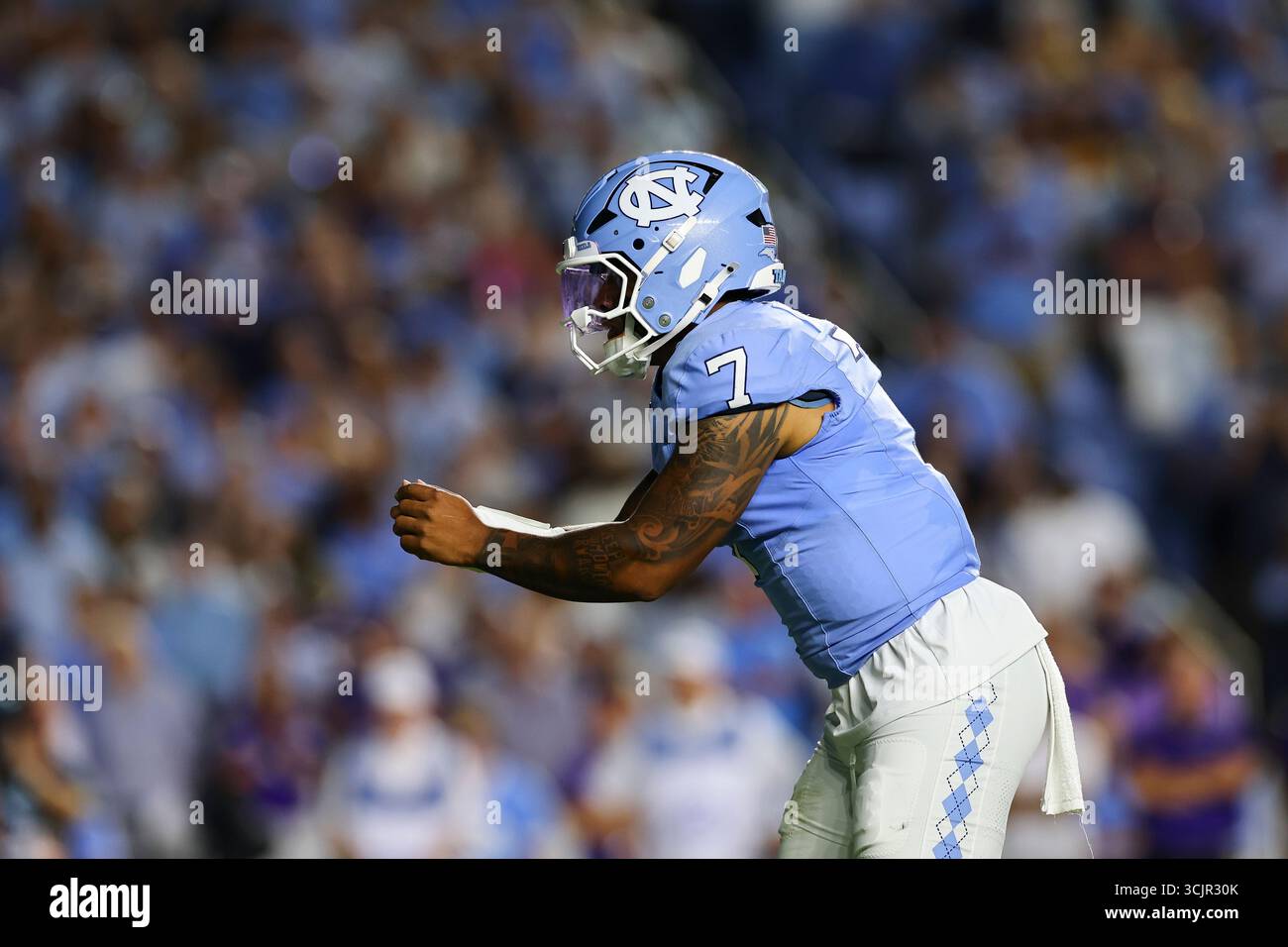 North Carolina quarterback Gio Lopez (7) prepares for the snap in the ...