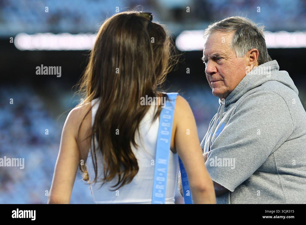 North Carolina head coach Bill Belichick stands on the sideline with ...
