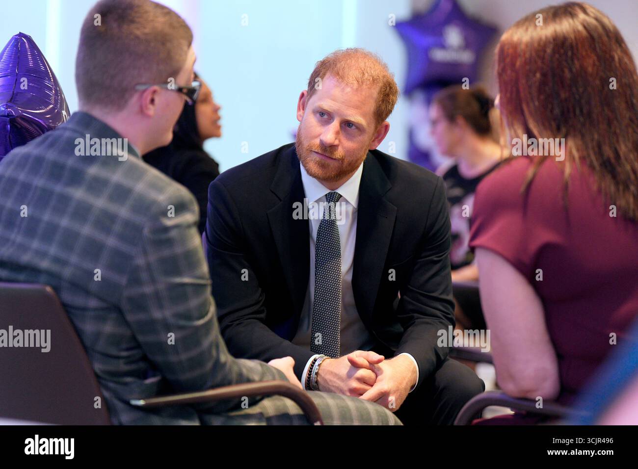 The Duke of Sussex speaks with Declan Bitmead (left), recipient of the ...