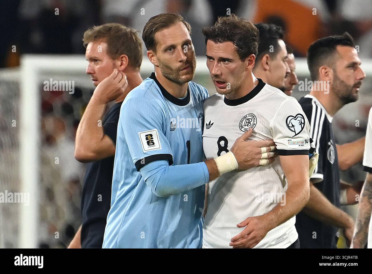 Final jubilation: goalkeeper Oliver BAUMANN (GER) with Leon GORETZKA ...