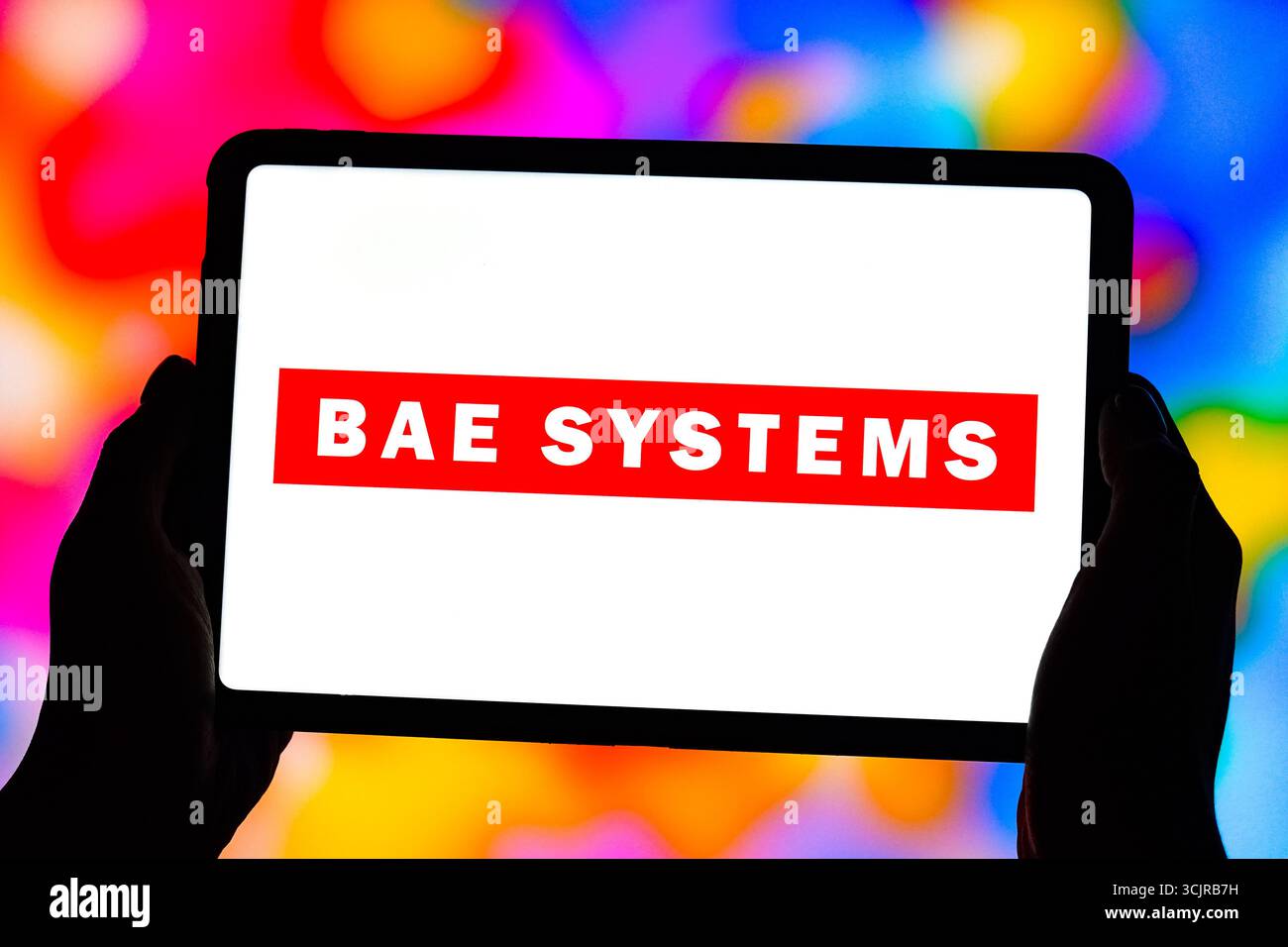 In this photo illustration, the logo of BAE Systems is seen displayed ...