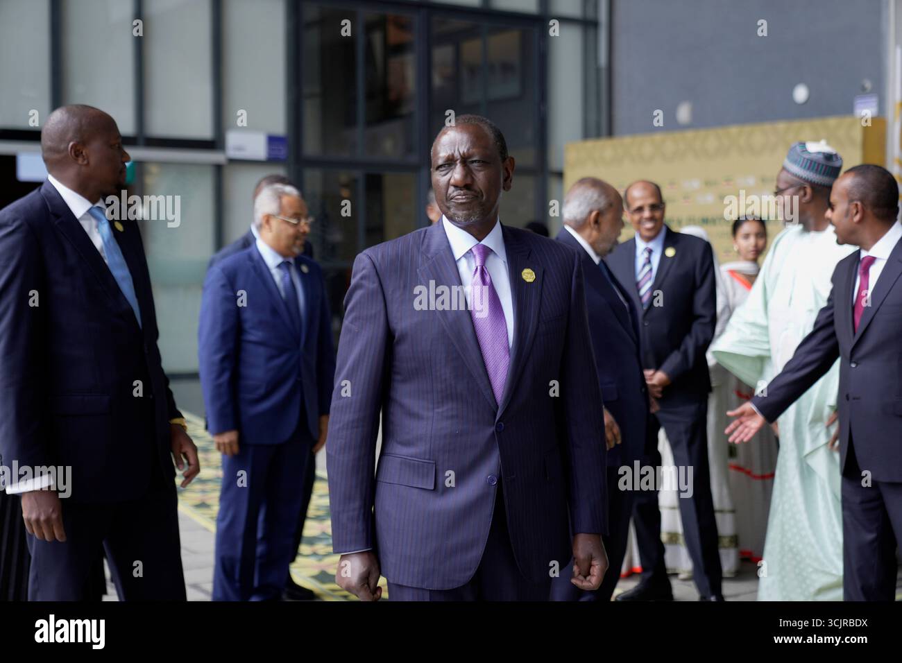 Kenyan President William Ruto stands with other African heads of state ...