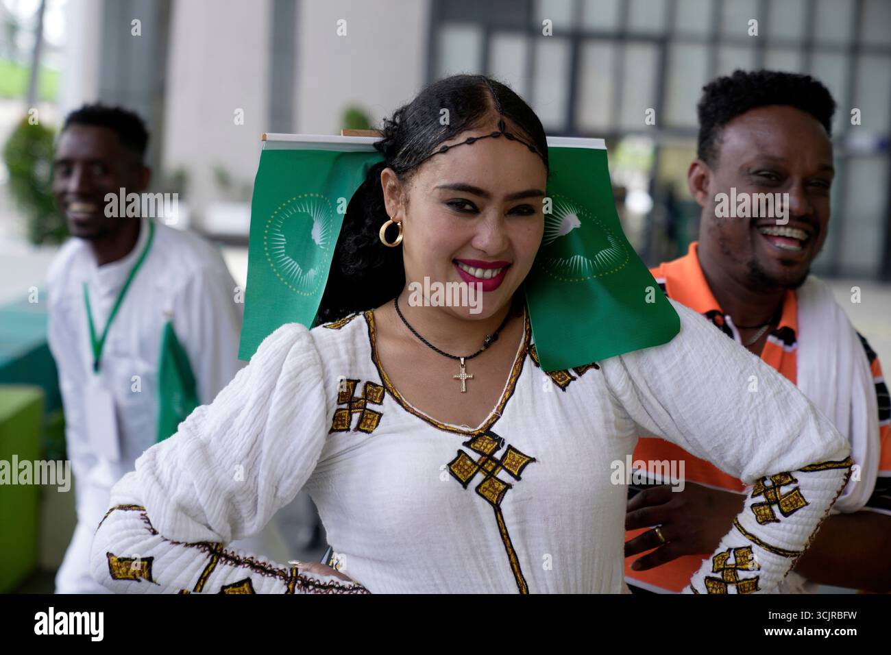 A participant poses for a photo during the opening of the High-Level ...