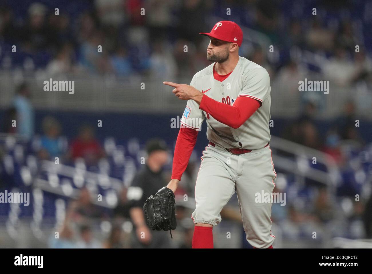 Philadelphia Phillies pitcher Tim Mayza reacts at the end of a baseball ...