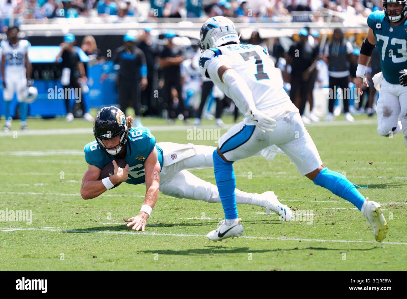 Jacksonville Jaguars quarterback Trevor Lawrence (16) dives for a first ...