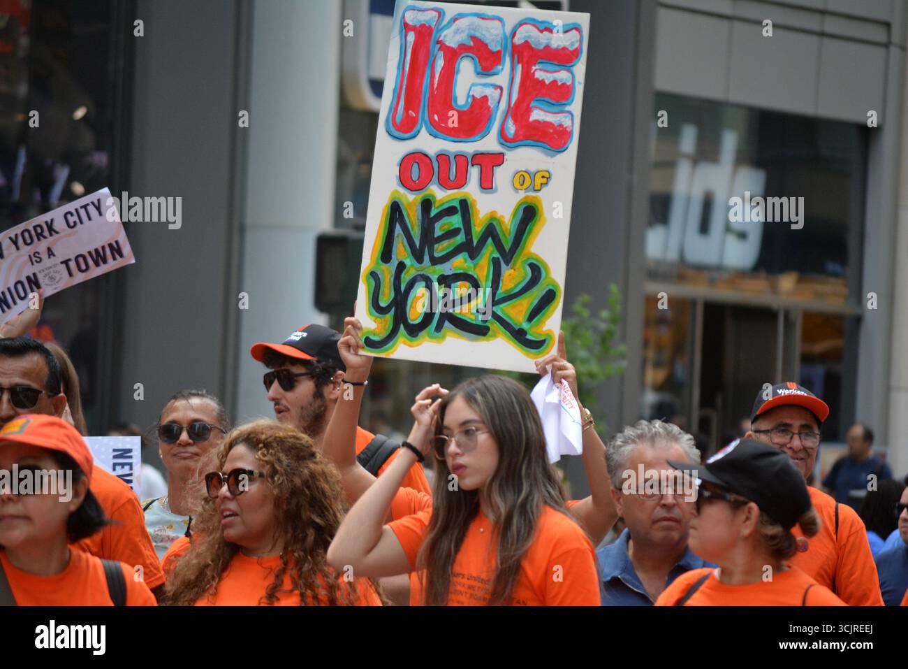 Anti-ICE sign held by a person marching in the annual Labor Day Parade ...