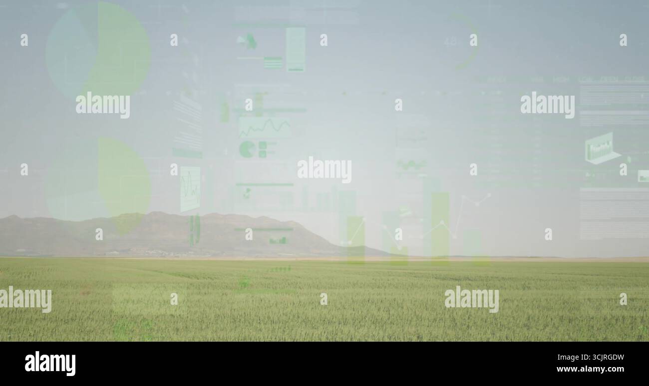 Displaying grassy field stretching toward distant mountain range under ...