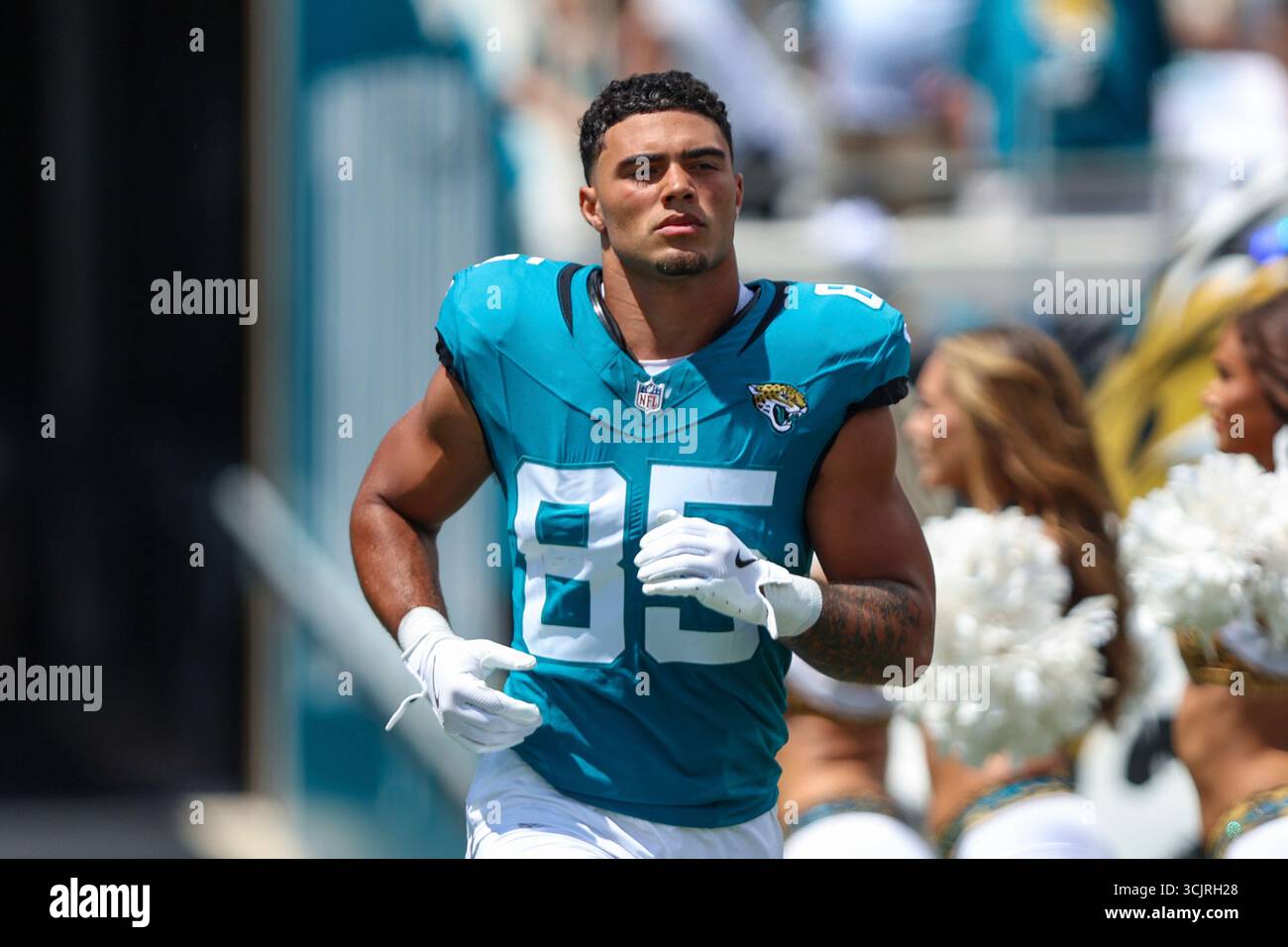 Jacksonville Jaguars tight end Brenton Strange (85) runs onto the field ...