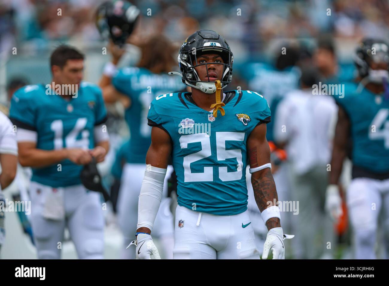 Jacksonville Jaguars safety Rayuan Lane III (25) walks the sideline ...