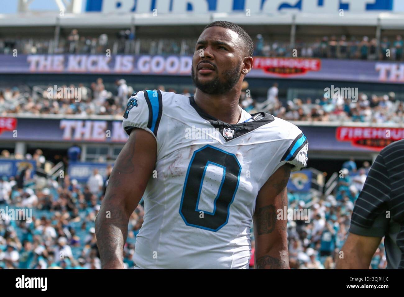 Carolina Panthers tight end Ja'Tavion Sanders (0) walks the sideline ...