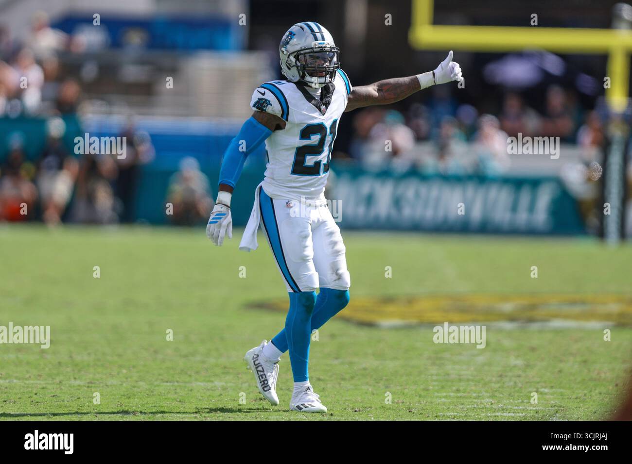 Carolina Panthers safety Nick Scott (21) signals before a play during ...