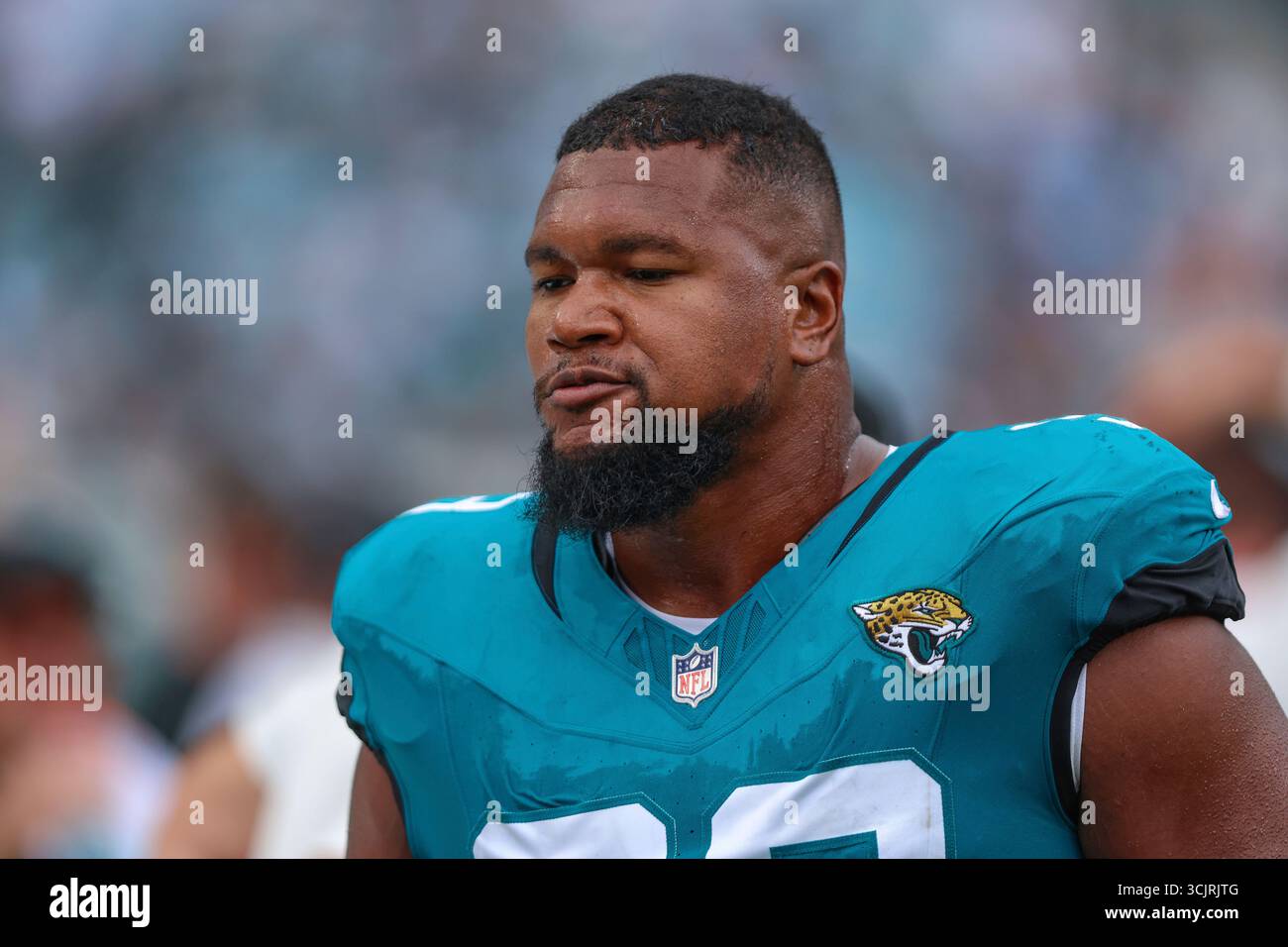 Jacksonville Jaguars' Dawuane Smoot walks the sideline during an NFL ...