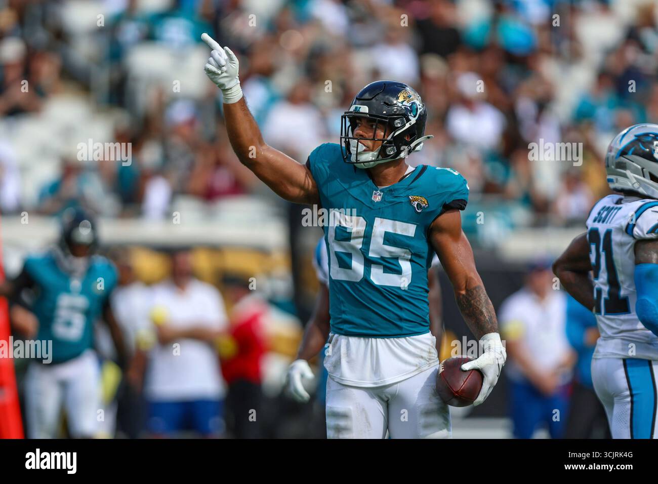 Jacksonville Jaguars tight end Brenton Strange (85) signals a first ...