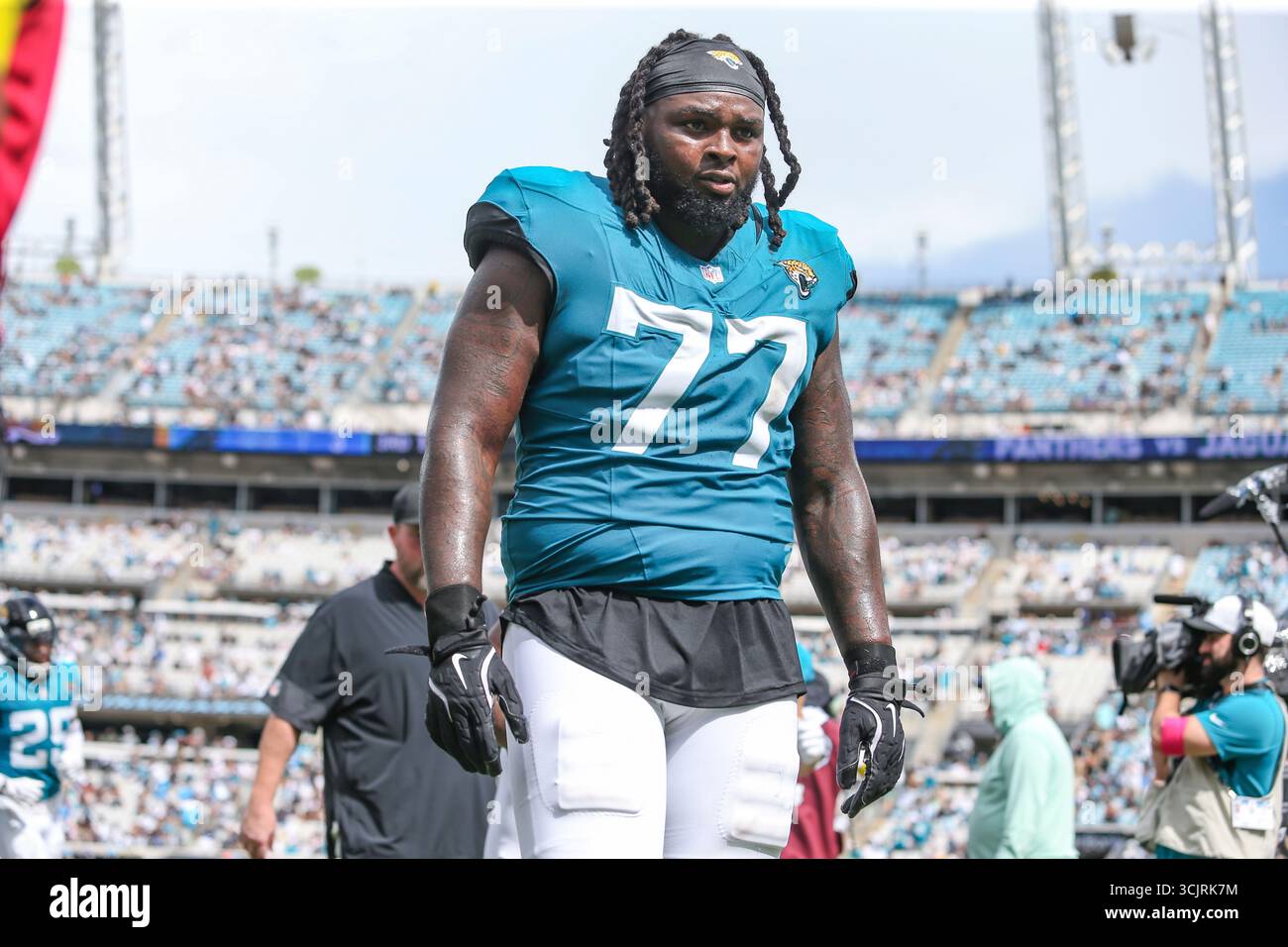 Jacksonville Jaguars offensive tackle Anton Harrison (77) leaves the ...