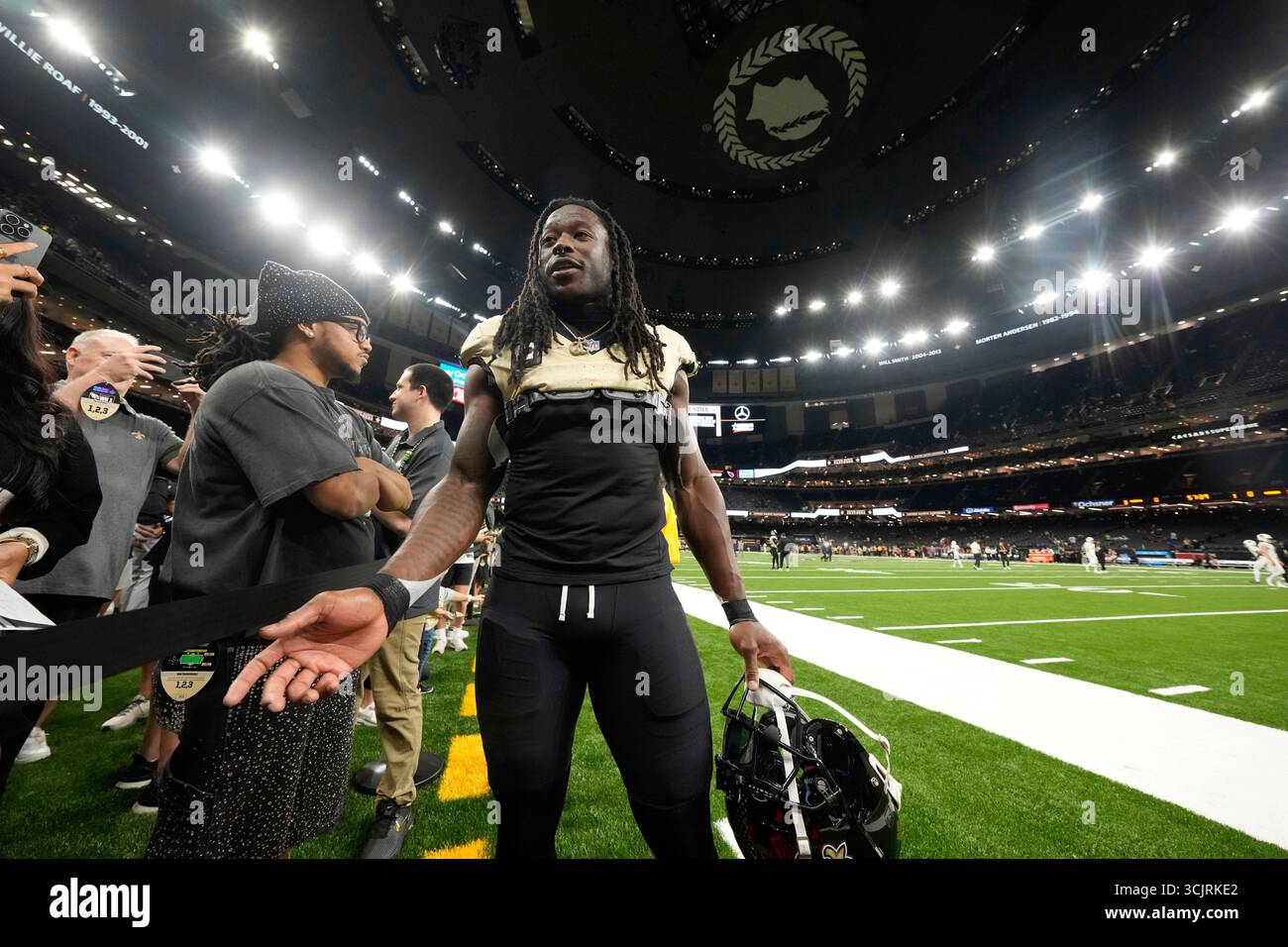 New Orleans Saints running back Alvin Kamara talks on the field before ...