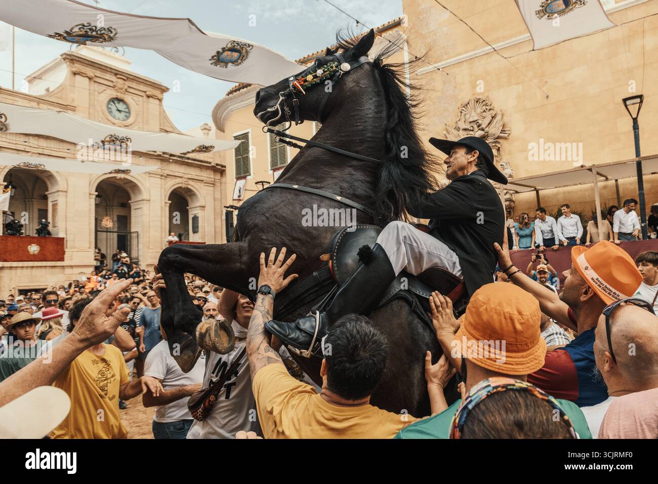 Mahon, Spain. 8 September, 2025: A 'caixer' (horse rider) rears up on ...