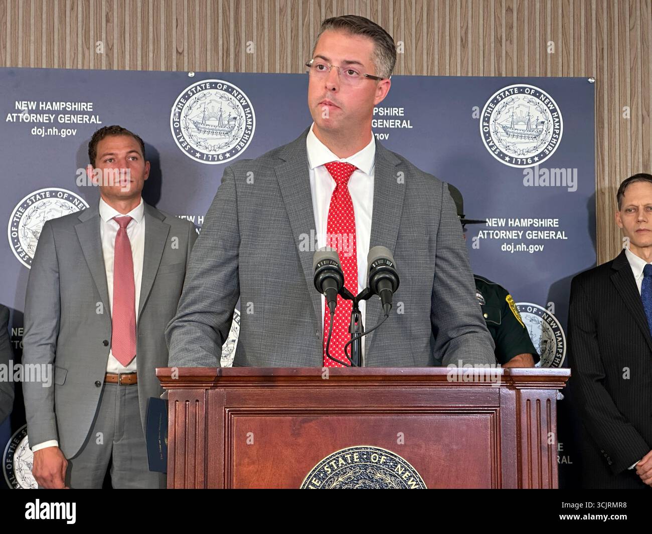 New Hampshire State Police Det. Sgt. Christopher Elphick speaks to ...