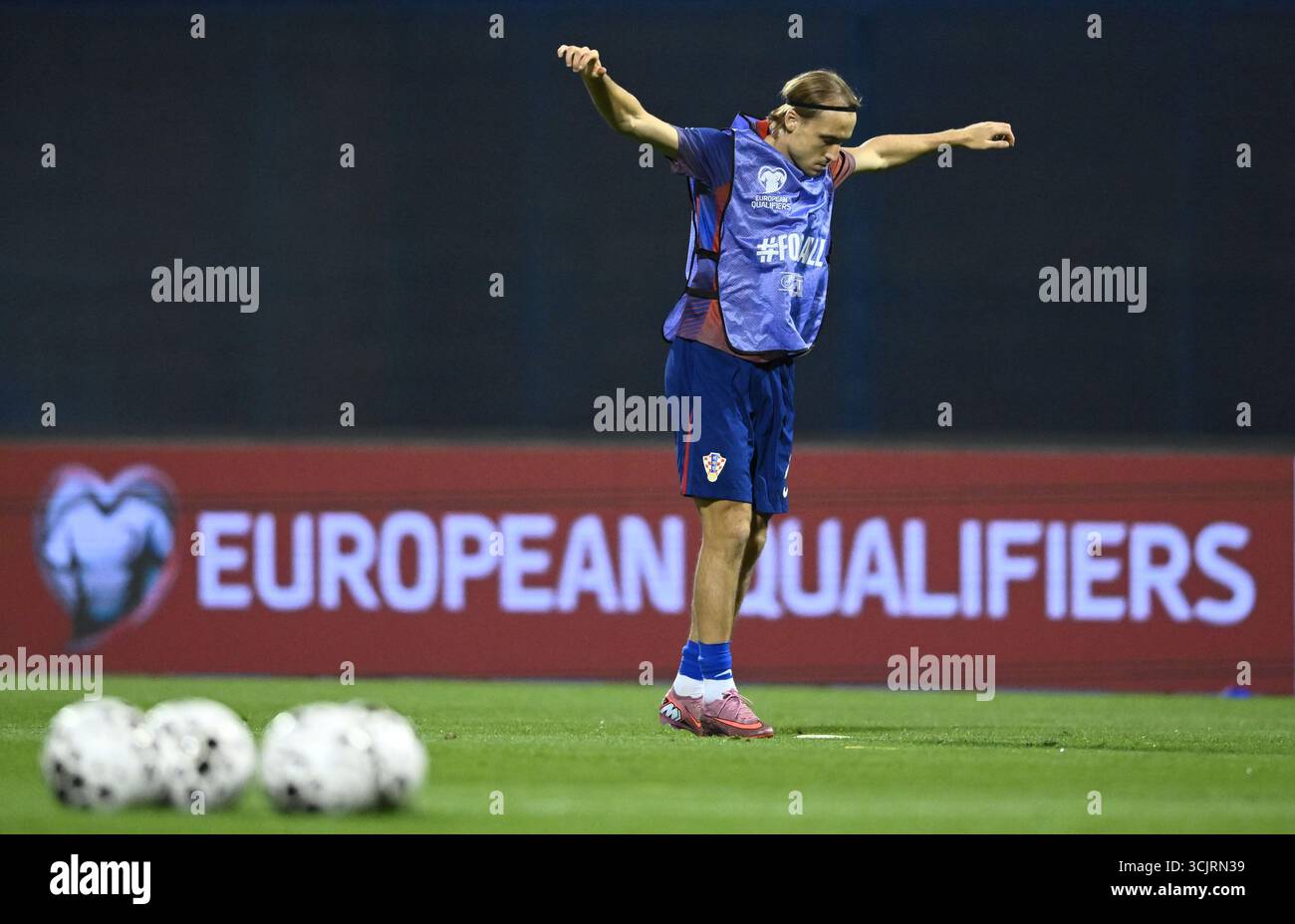 Lovro Majer of Croatia warms up prior to the FIFA World Cup 2026 ...
