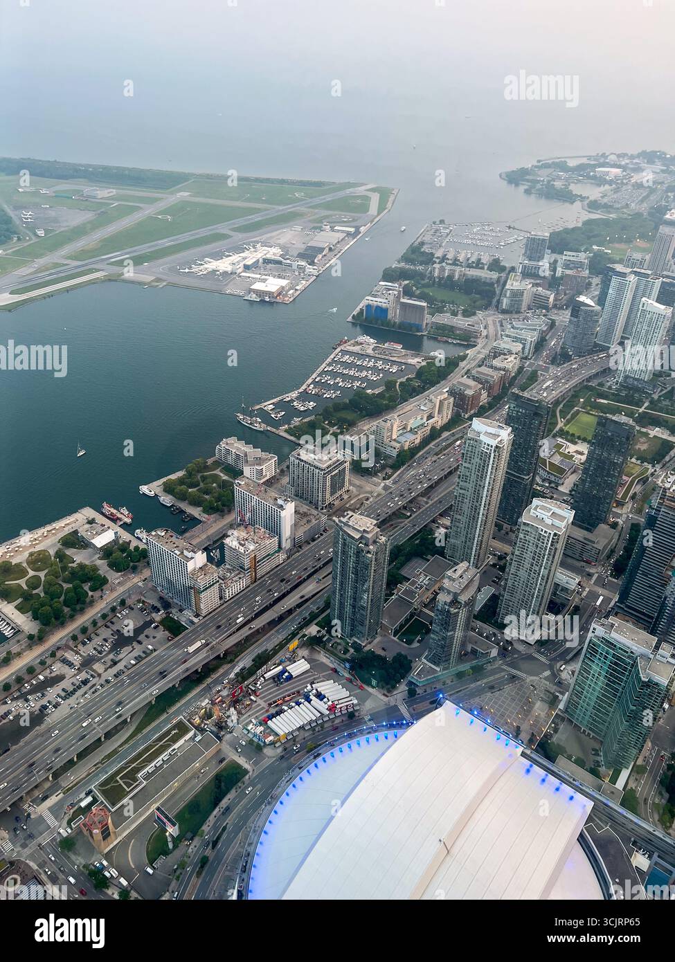 Looking down at Toronto lakeside streets from the CN Tower observation ...