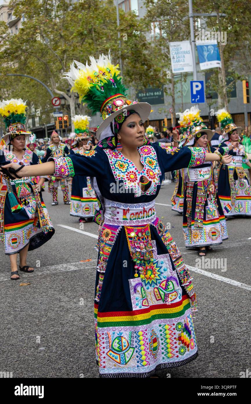 October 12, 2024, Barcelona (Spain). Members of a folk group wearing ...
