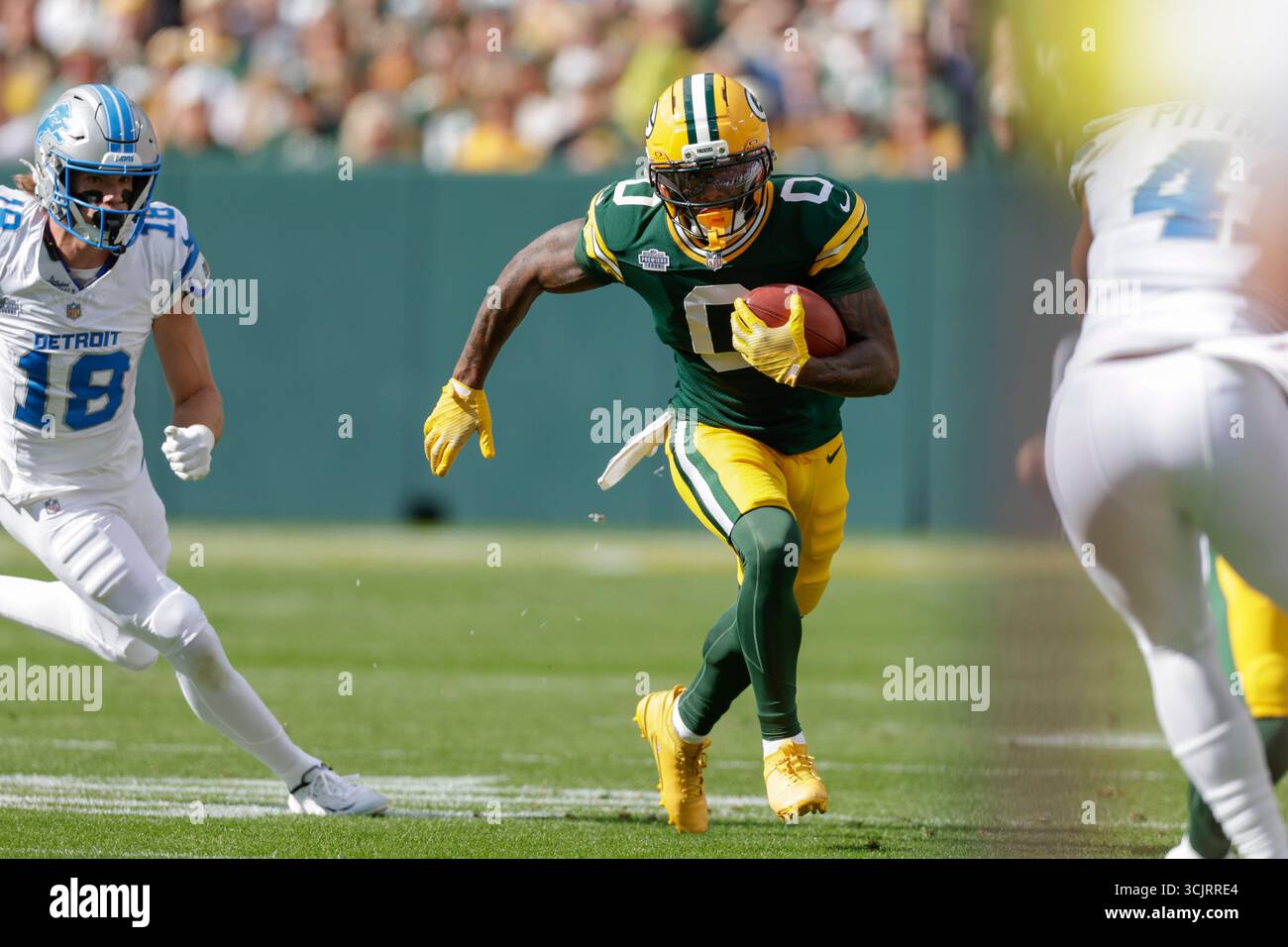 Green Bay Packers wide receiver Matthew Golden (0) returns a punt ...