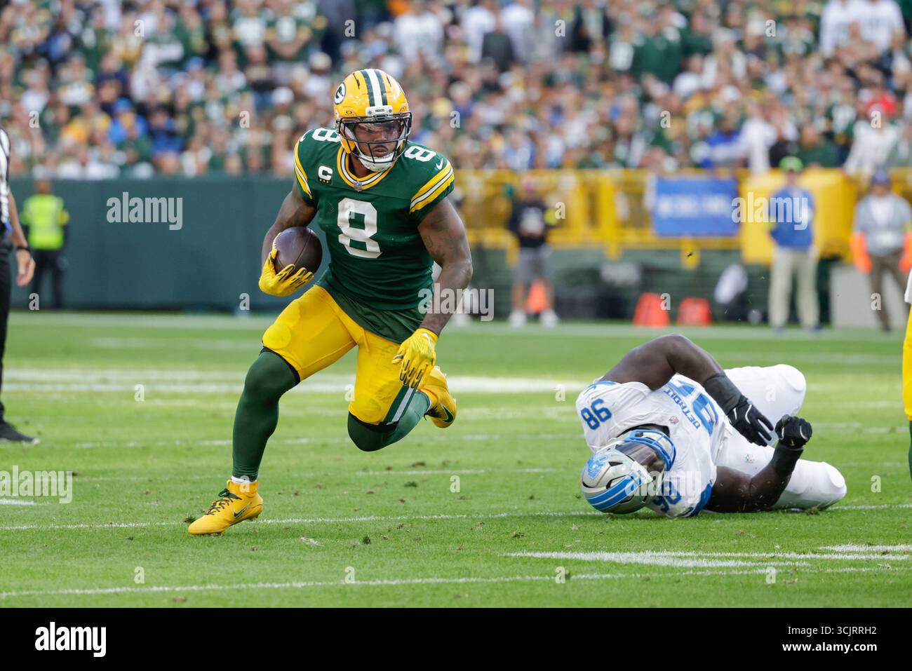 Green Bay Packers running back Josh Jacobs (8) rushes during an NFL ...
