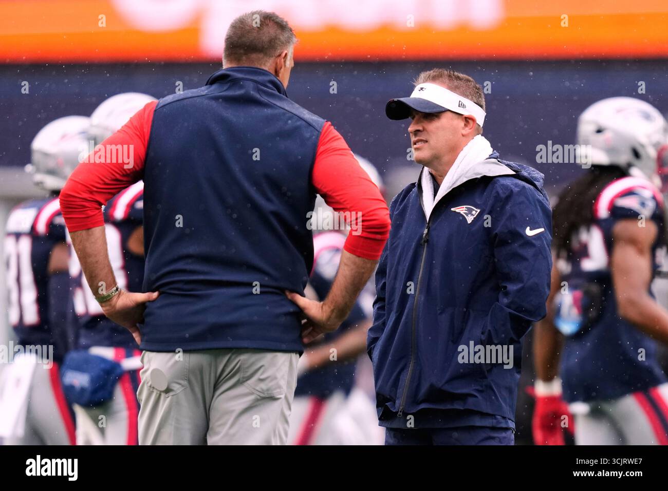 New England Patriots offensive coordinator Josh McDaniels, right, talks ...