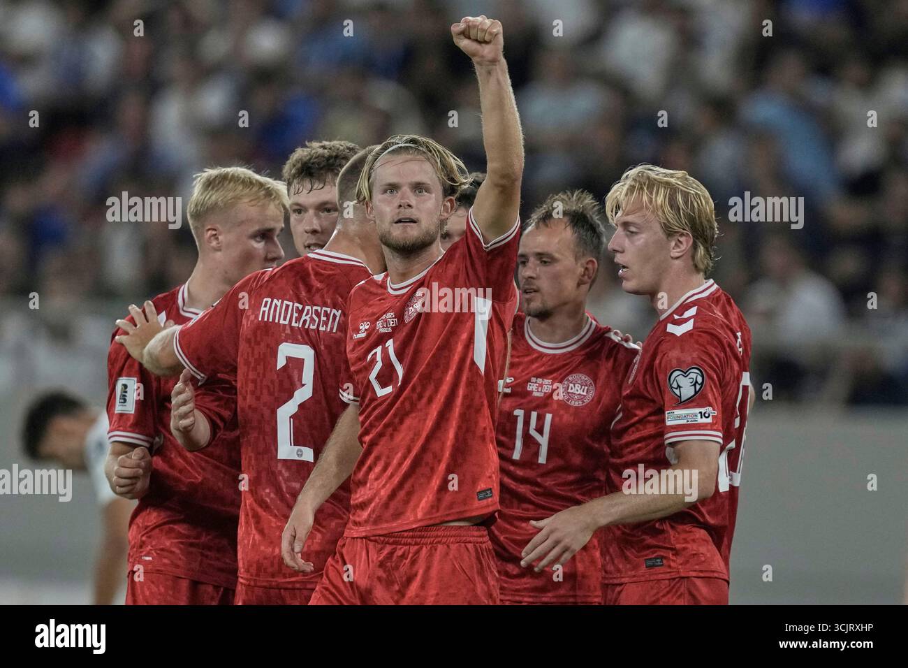 Danish players celebrate after a goal during a World Cup qualifying ...