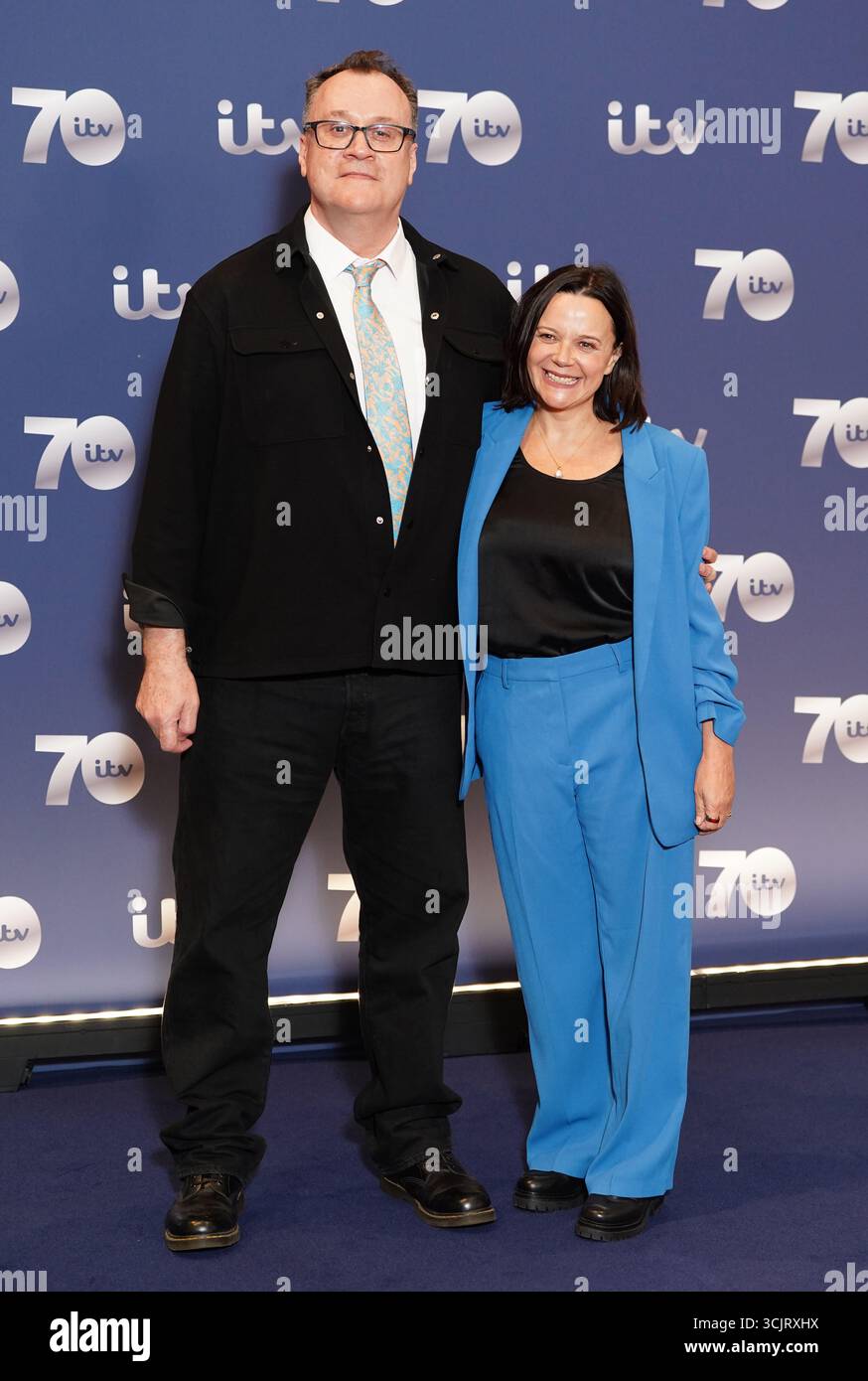 Russell T Davies (left) and guest attend the ITV 70th celebration event ...