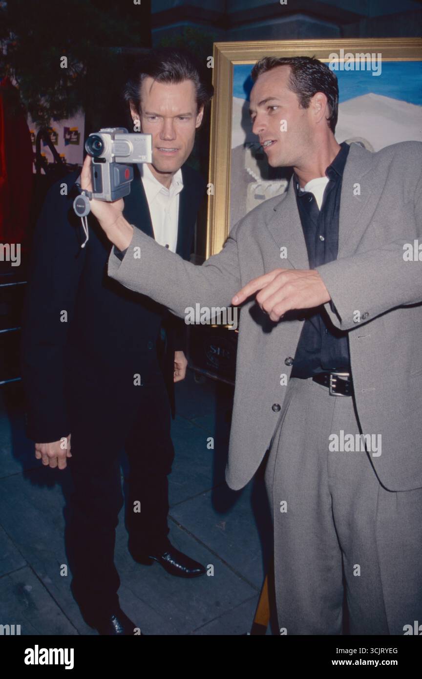 Randy Travis and Luke Perry at the Private Issue Credit Card Design and ...