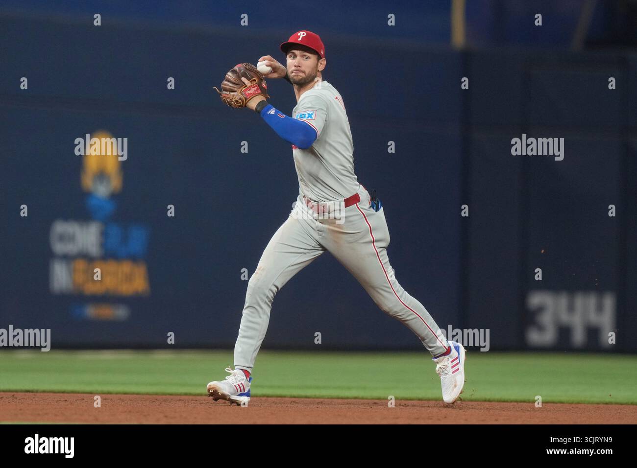Philadelphia Phillies shortstop Trea Turner fields a hit during a ...