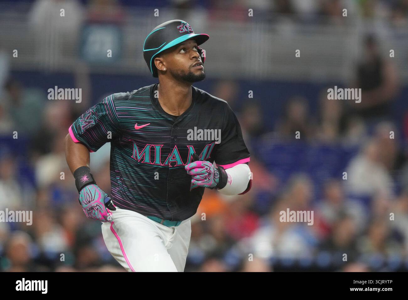 Miami Marlins' Otto Lopez hits a single during a baseball game against ...
