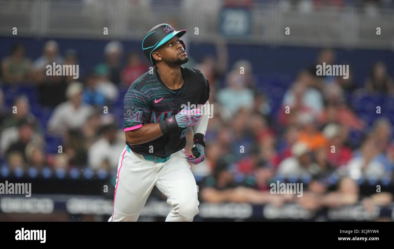 Miami Marlins' Otto Lopez hits a single during a baseball game against ...