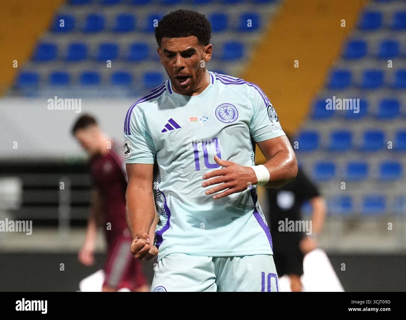 Scotland's Che Adams celebrates scoring their side's first goal of the ...