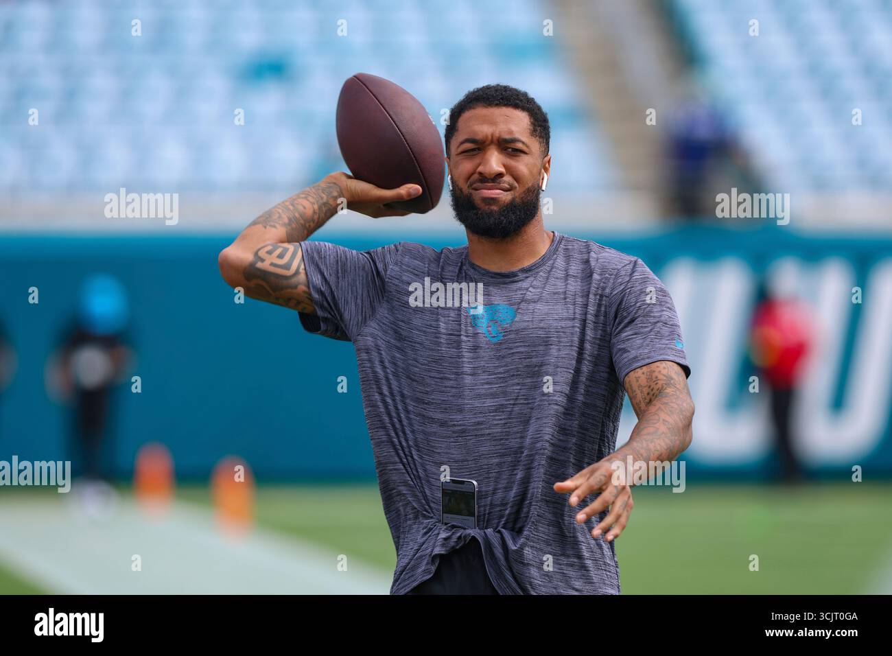 Jacksonville Jaguars defensive end Josh Hines-Allen (41) warms up ...