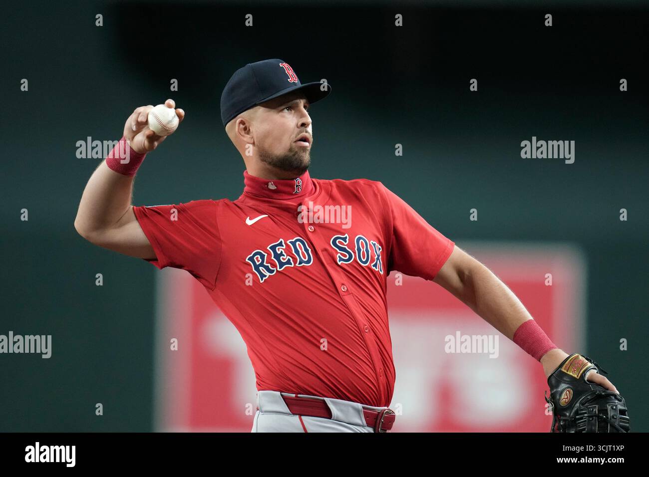Boston Red Sox First Baseman Nathaniel Lowe Tosses A Ball Into The
