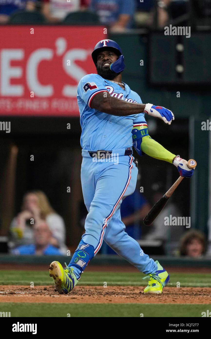 Texas Rangers' Adolis Garcia follows throug on a swing during a ...