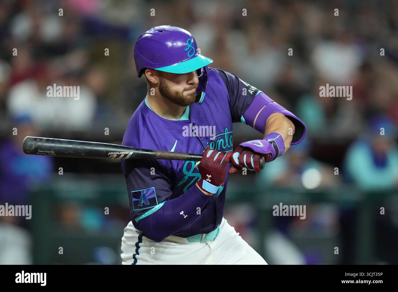 Arizona Diamondbacks' Tyler Locklear checks his swing during the eighth ...