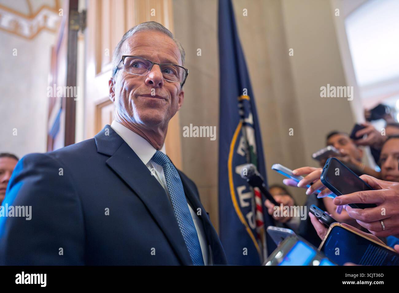 Senate Majority Leader John Thune, R-S.D., speaks to reporters on ...